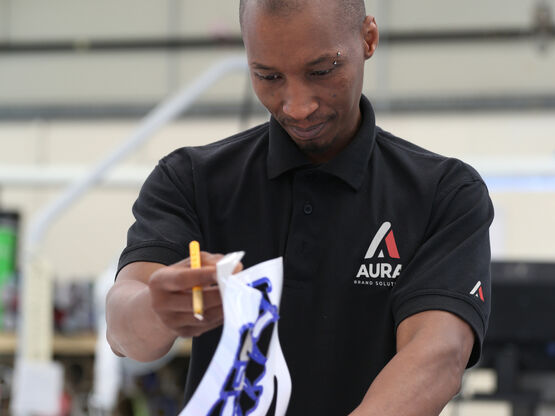 Aura | Graphics & signage production for branding projects