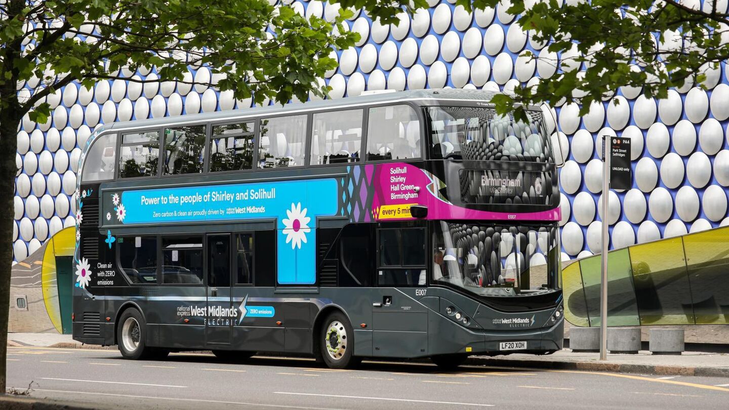 Eco-Friendly Electric Double-Decker Bus Wraps For National… | Aura